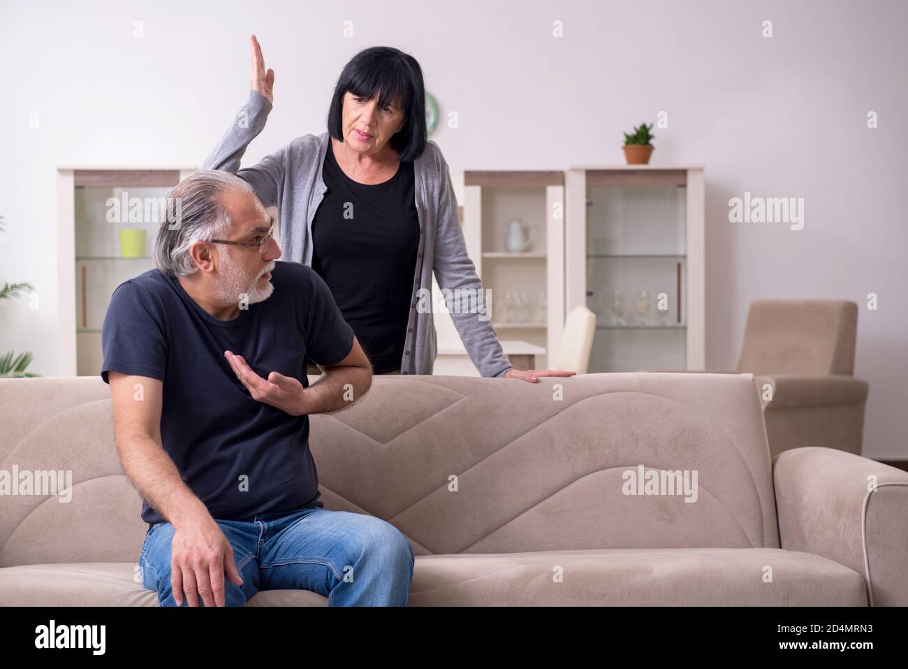 Old couple having argument at the home Stock Photo - Alamy