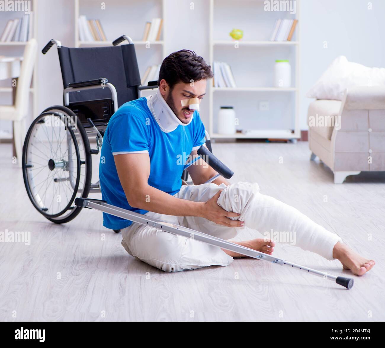 The injured young man recovering at home Stock Photo - Alamy