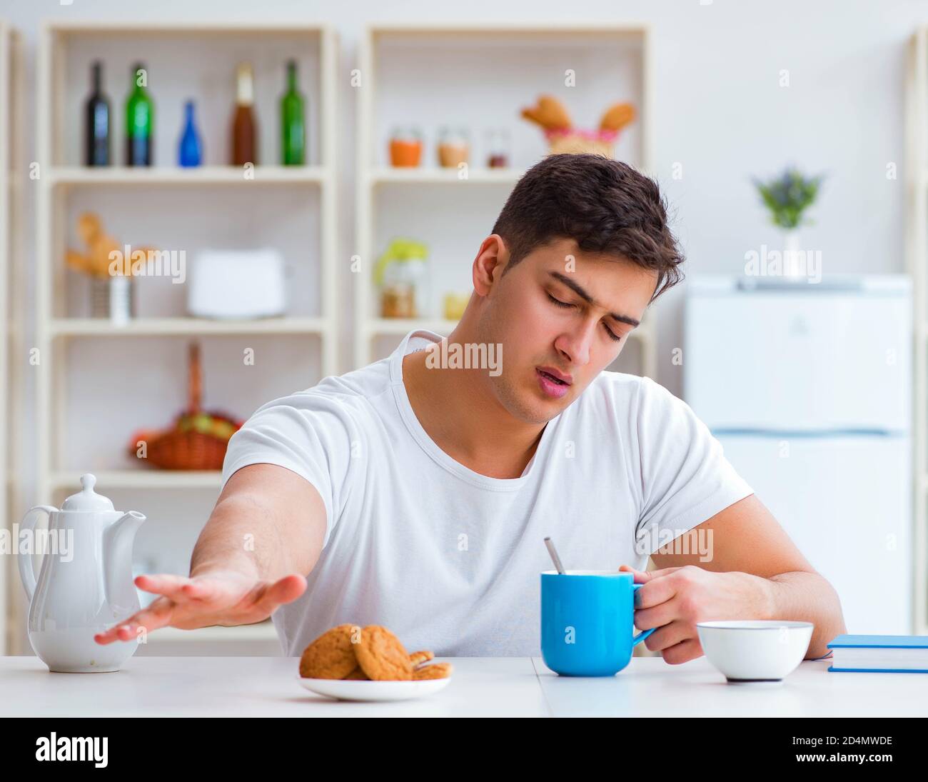 Man falling asleep during hi-res stock photography and images - Alamy