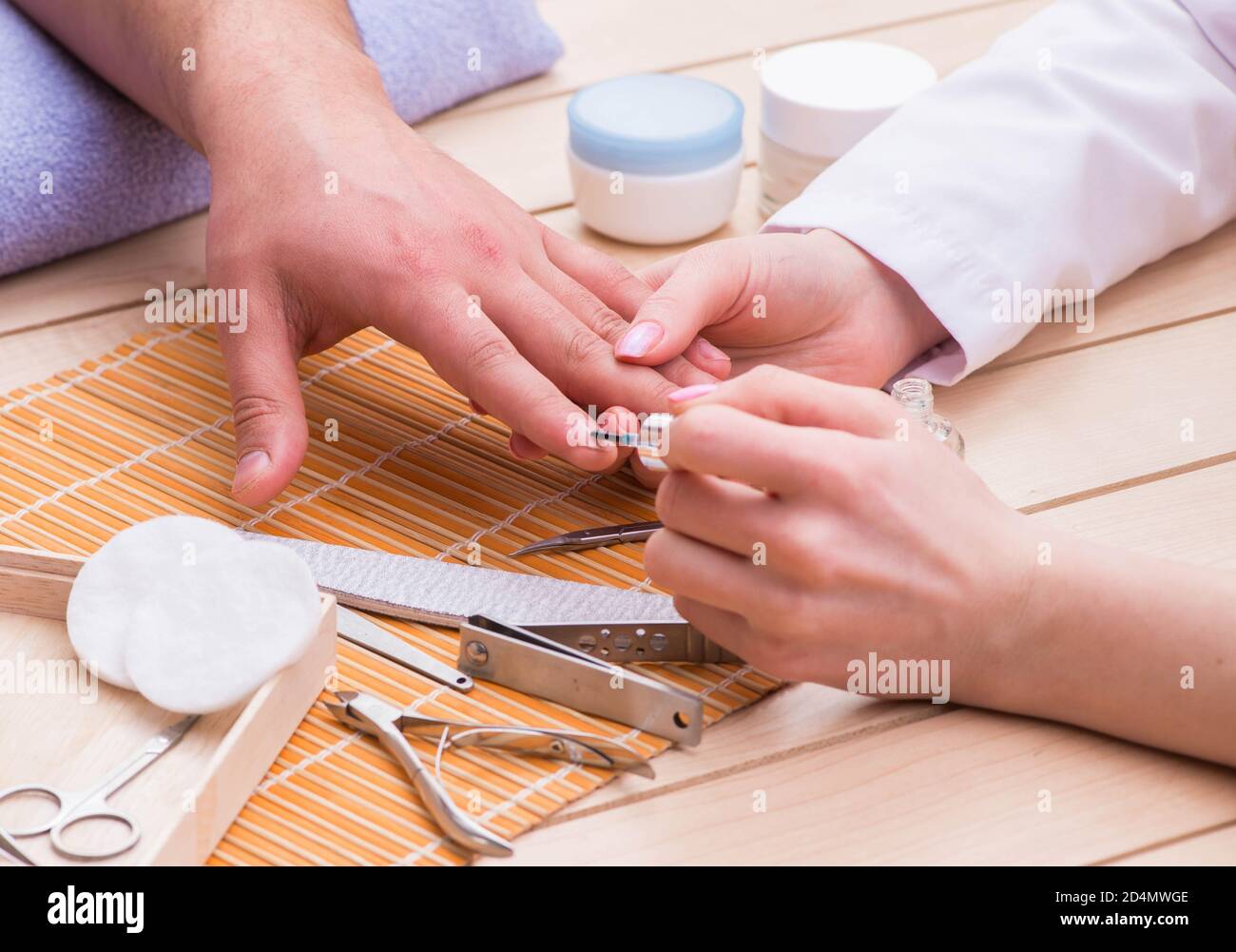 The hand manicure concept for man Stock Photo - Alamy