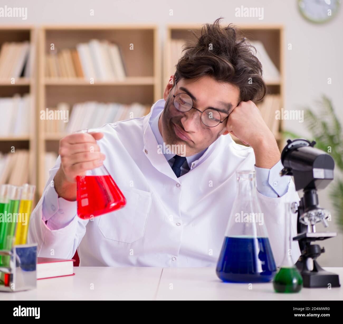 The mad crazy scientist doctor doing experiments in a laboratory Stock ...