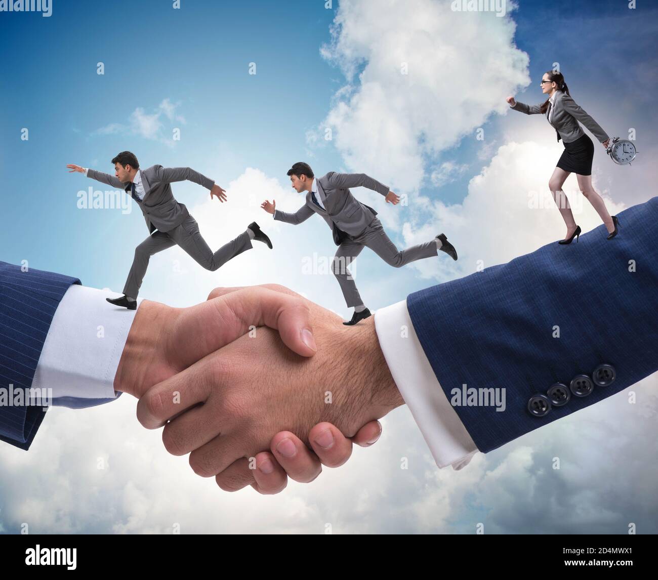 The cooperation concept with people running on handshake Stock Photo ...