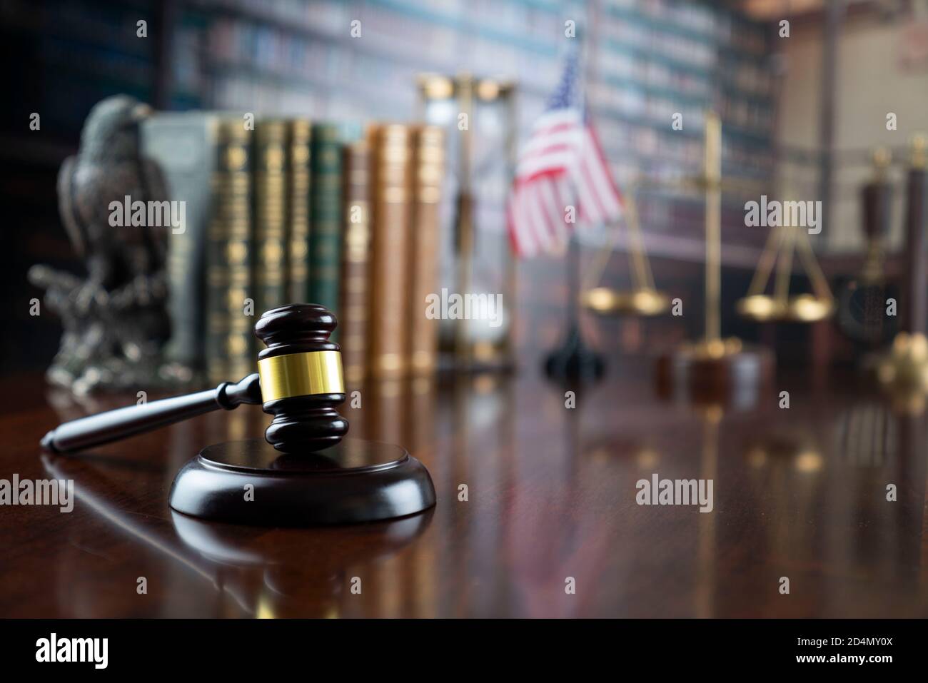 Judge office. Gavel on brown shining table and collection of legal ...