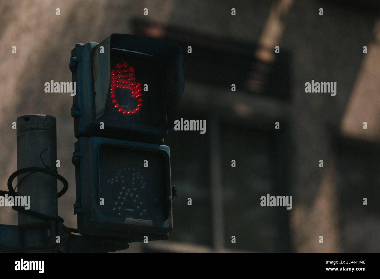 Closeup shot of a red hand stop sign on a traffic light Stock Photo - Alamy