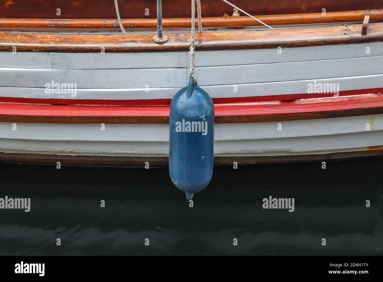 Floating mooring blue boat buoy Stock Photo - Alamy