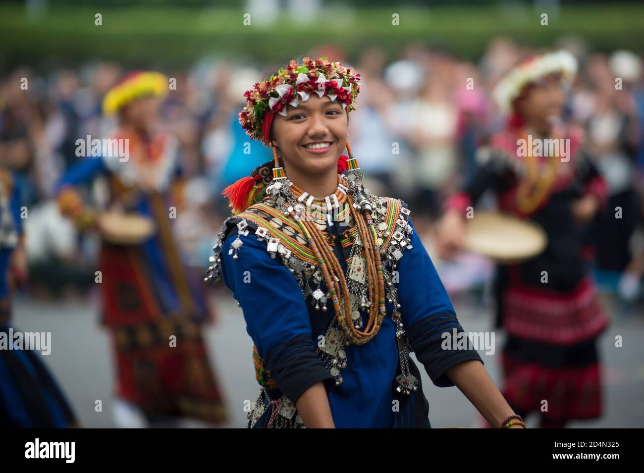 A girl in a traditional costume seen performing during the Double Tenth ...