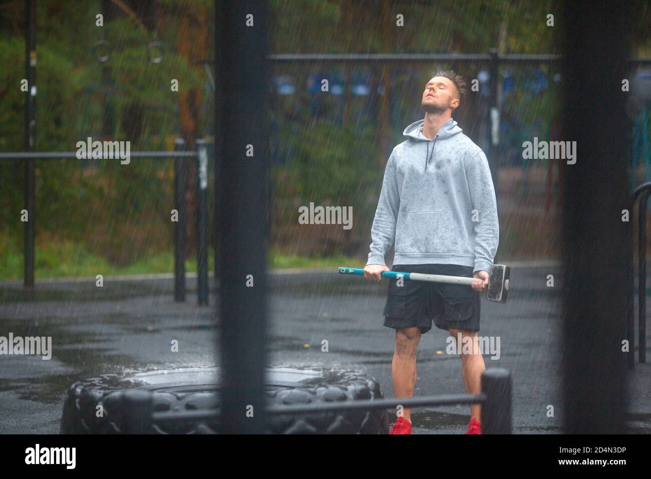 Portrait of a sportsman having rest after hard workout outdoor in a ...