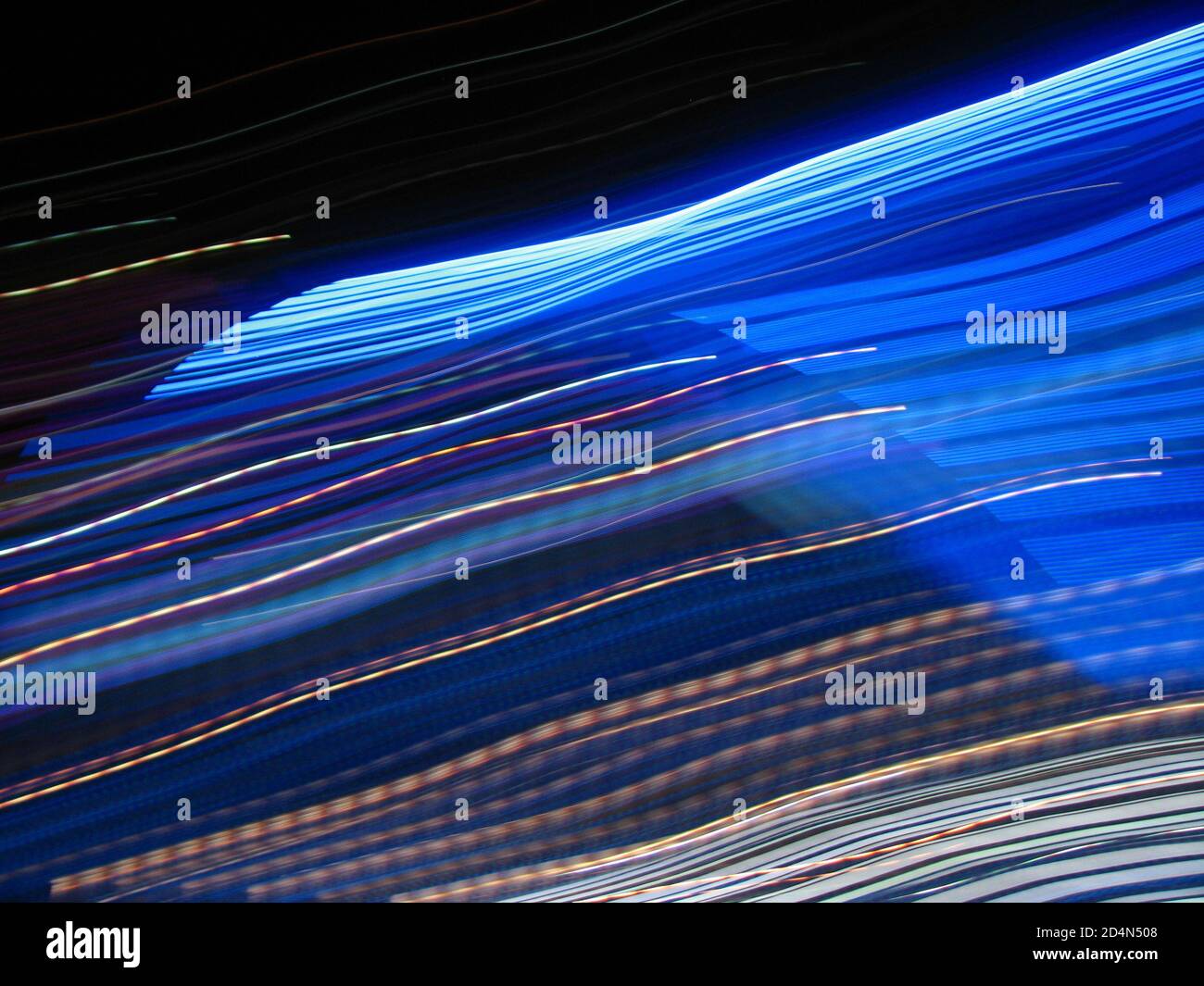 Abstract background with colorful light trails Stock Photo - Alamy