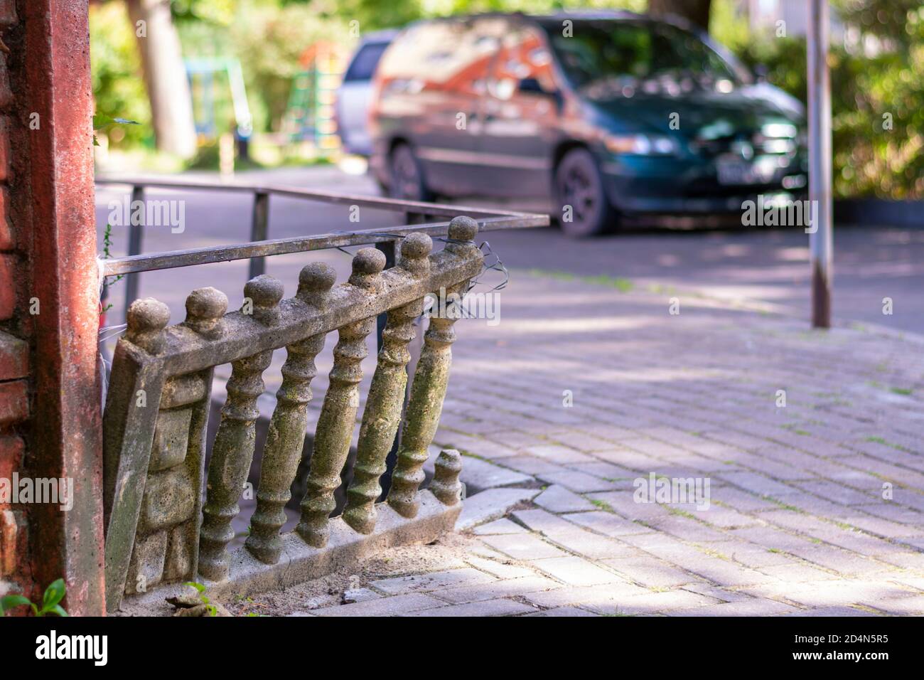 Old stone balustrades on the streets of the city are askew. The ...