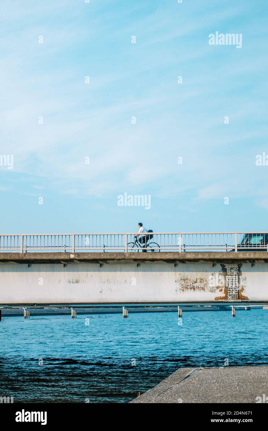 Japan bridge bycicle Stock Photo - Alamy