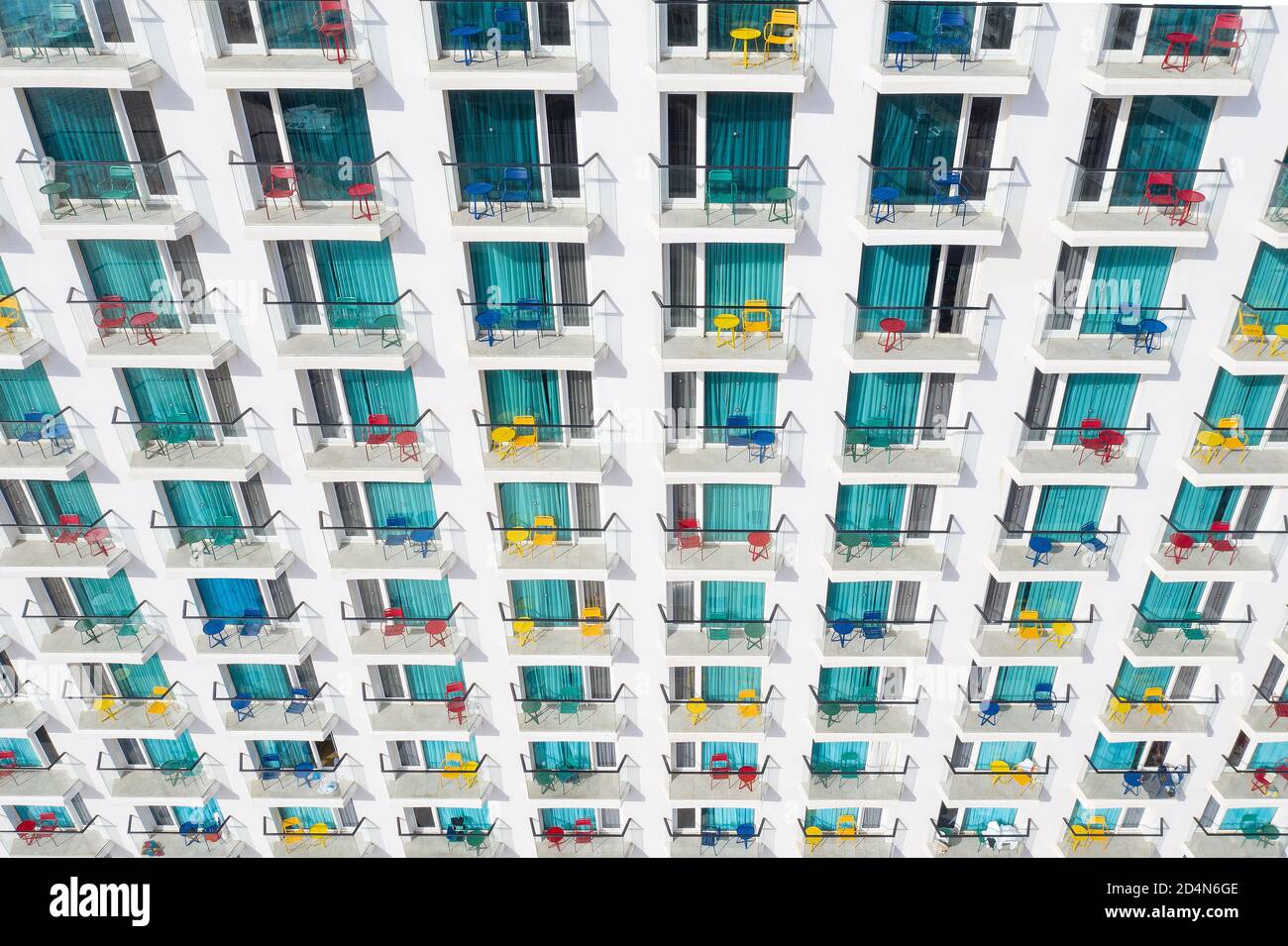 Hotel windows, balconies and colourful chairs, Aerial image Stock Photo ...