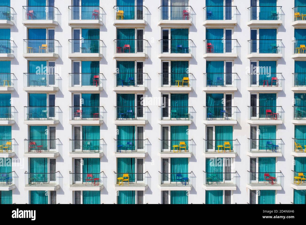 Hotel windows, balconies and colourful chairs, Aerial image Stock Photo ...