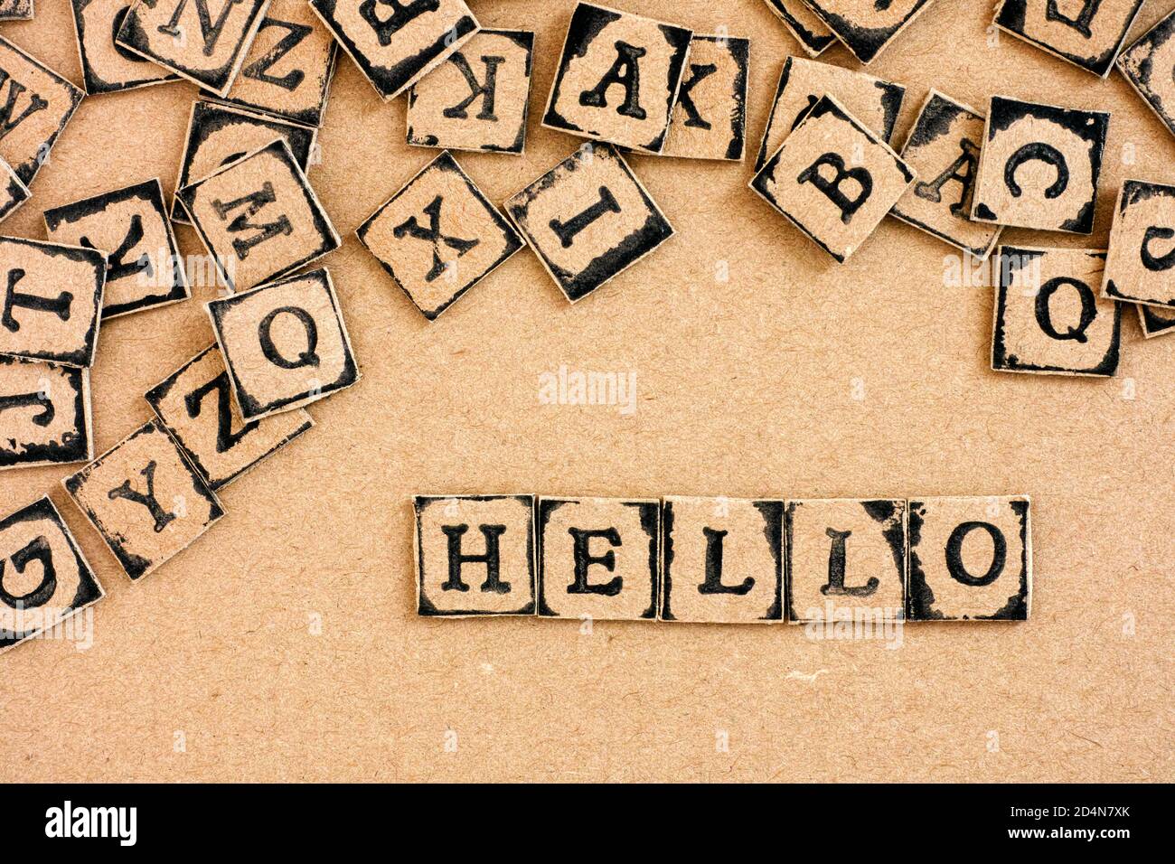 Word Hello spelled out from cardboard letters made by black alphabet ...