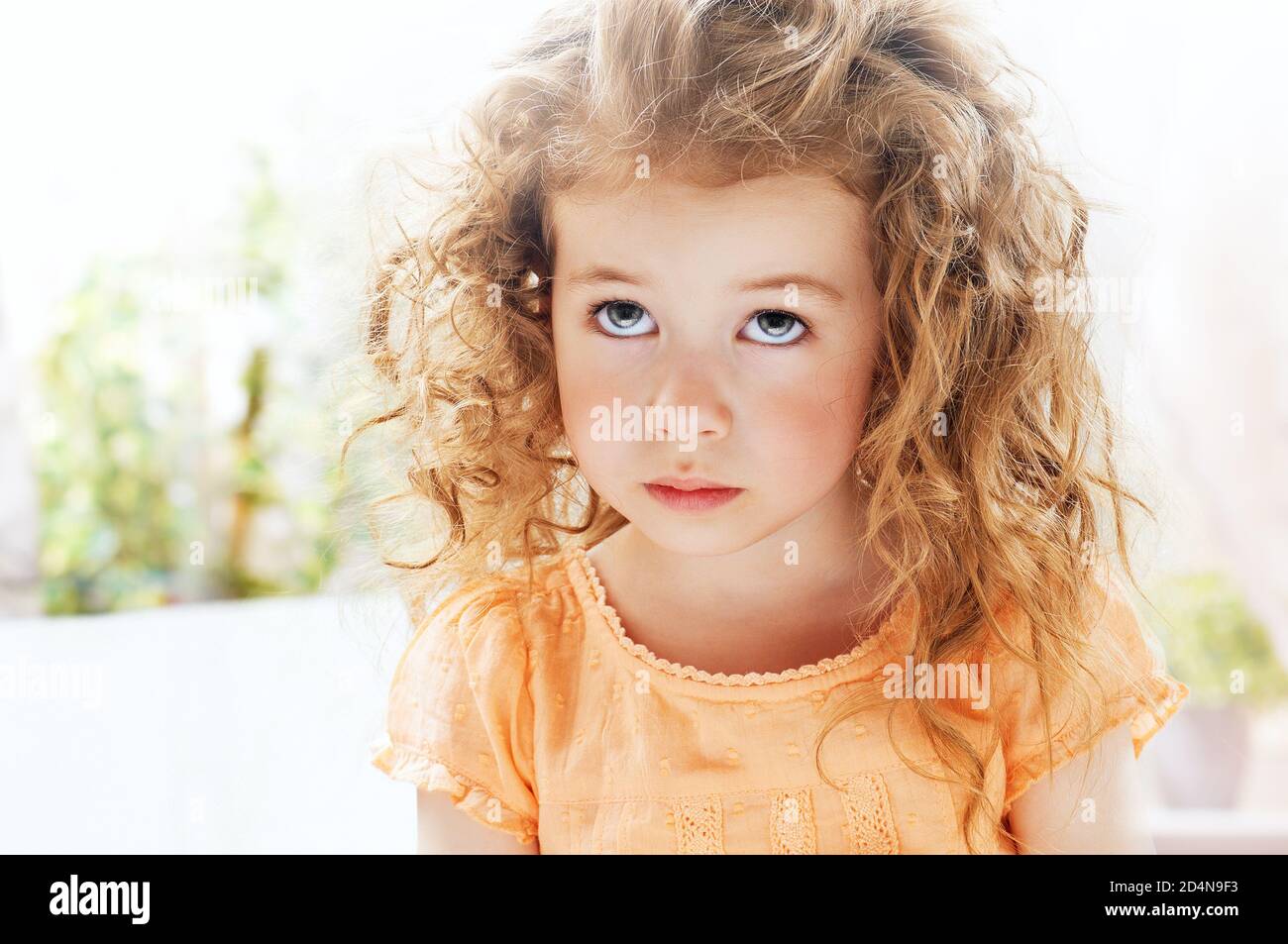 beautiful child is sad Stock Photo - Alamy