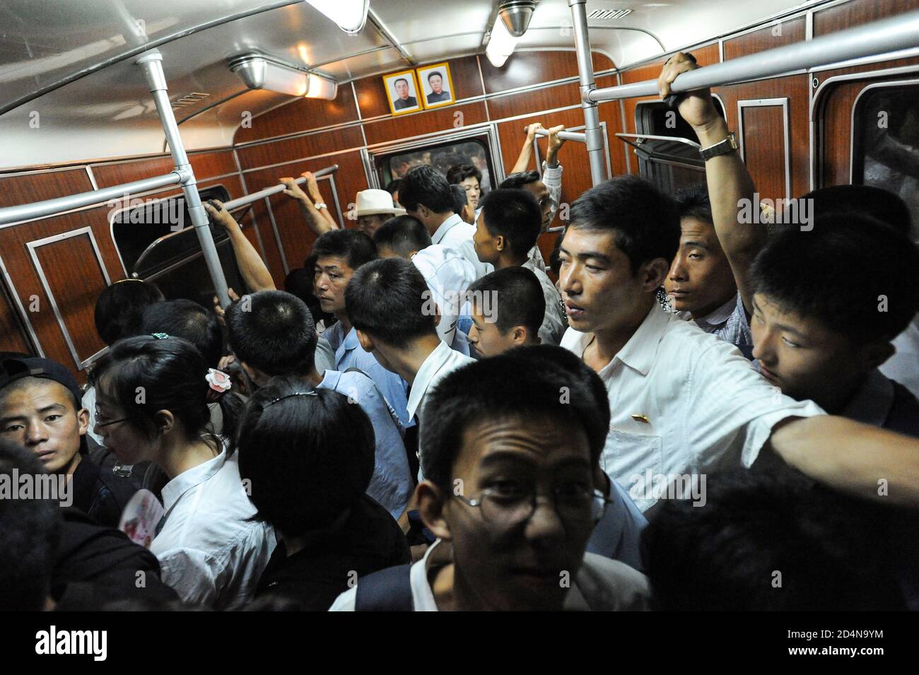 09.08.2012, Pyongyang, North Korea, Asia - Commuters inside a subway ...