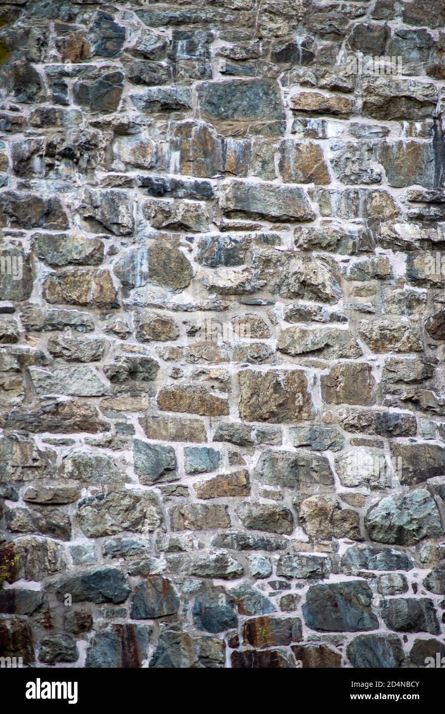 Colorful large Victorian stone wall vertical image Stock Photo - Alamy