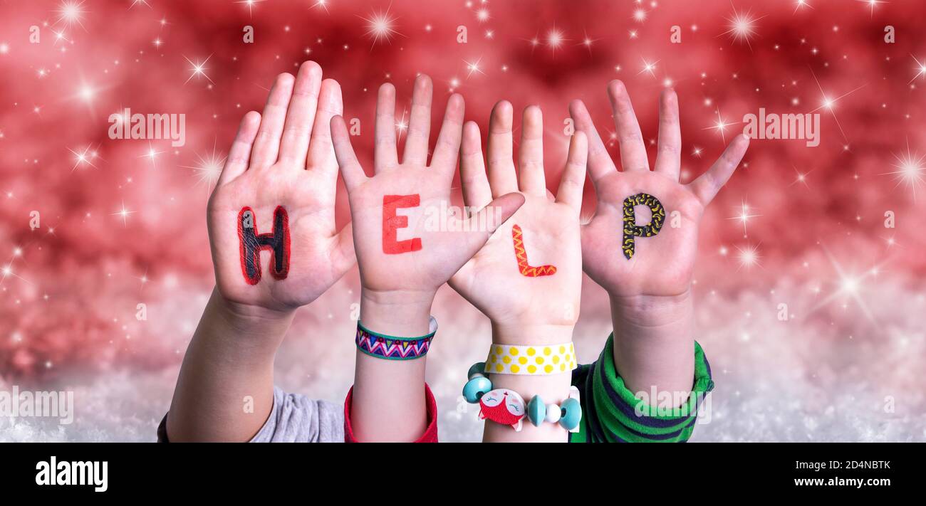 Children Hands Building Word Help, Red Christmas Background Stock Photo ...