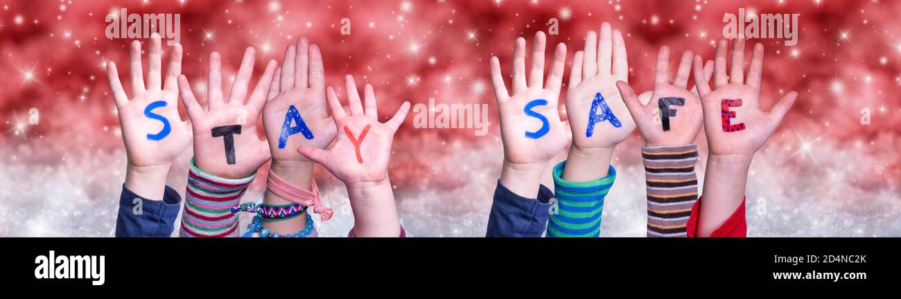 Children Hands Building Word Stay Safe, Red Christmas Background Stock ...