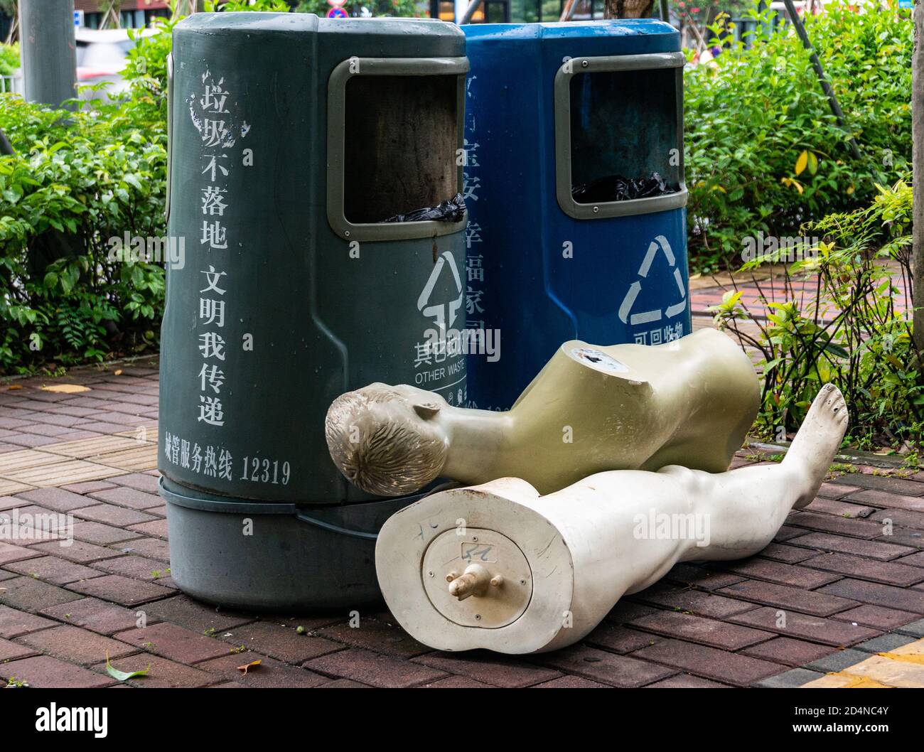 Odd rubbish on the pavement Stock Photo - Alamy