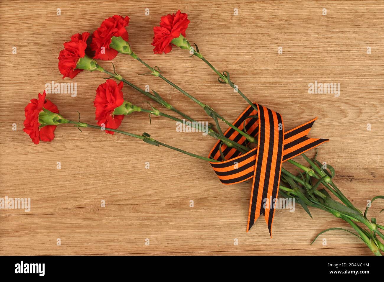 Carnation flowers with St. George`s ribbon - concept of victory Stock ...