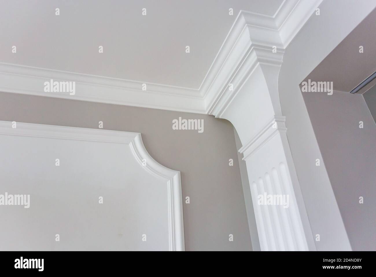 Detail of corner ceiling with intricate crown molding Stock Photo - Alamy