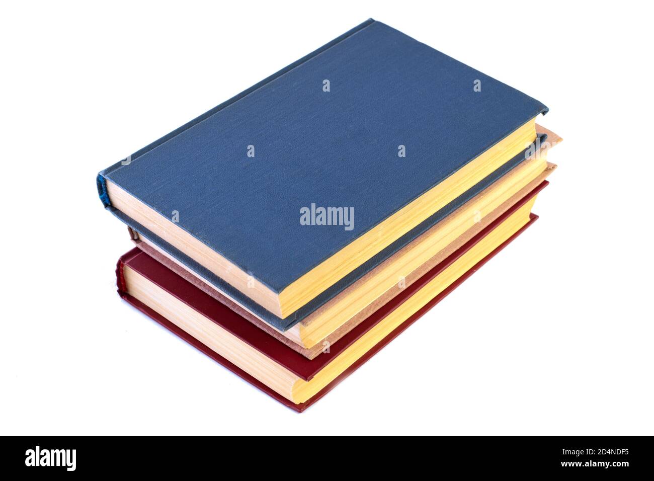 stack of three books isolated on white background Stock Photo - Alamy