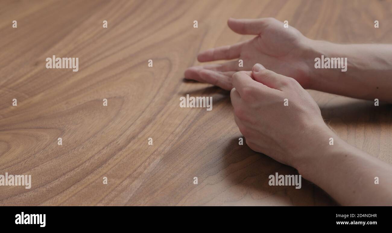 man hand suggestions gesture on black walnut table, wide photo Stock ...