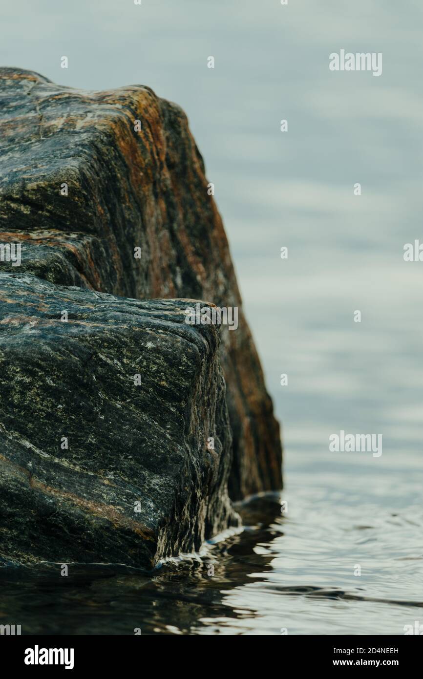 Grey boulders and water reflection hi-res stock photography and images ...