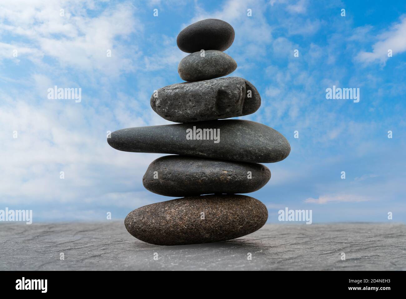 Hand stacking stones hi-res stock photography and images - Alamy