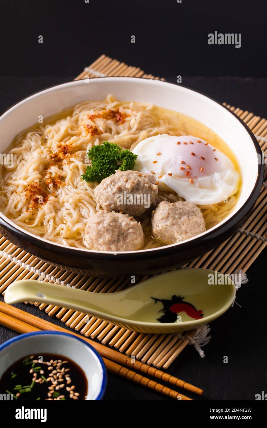 Asian food concept Egg noodles Ramen Asian style with meatball on ...