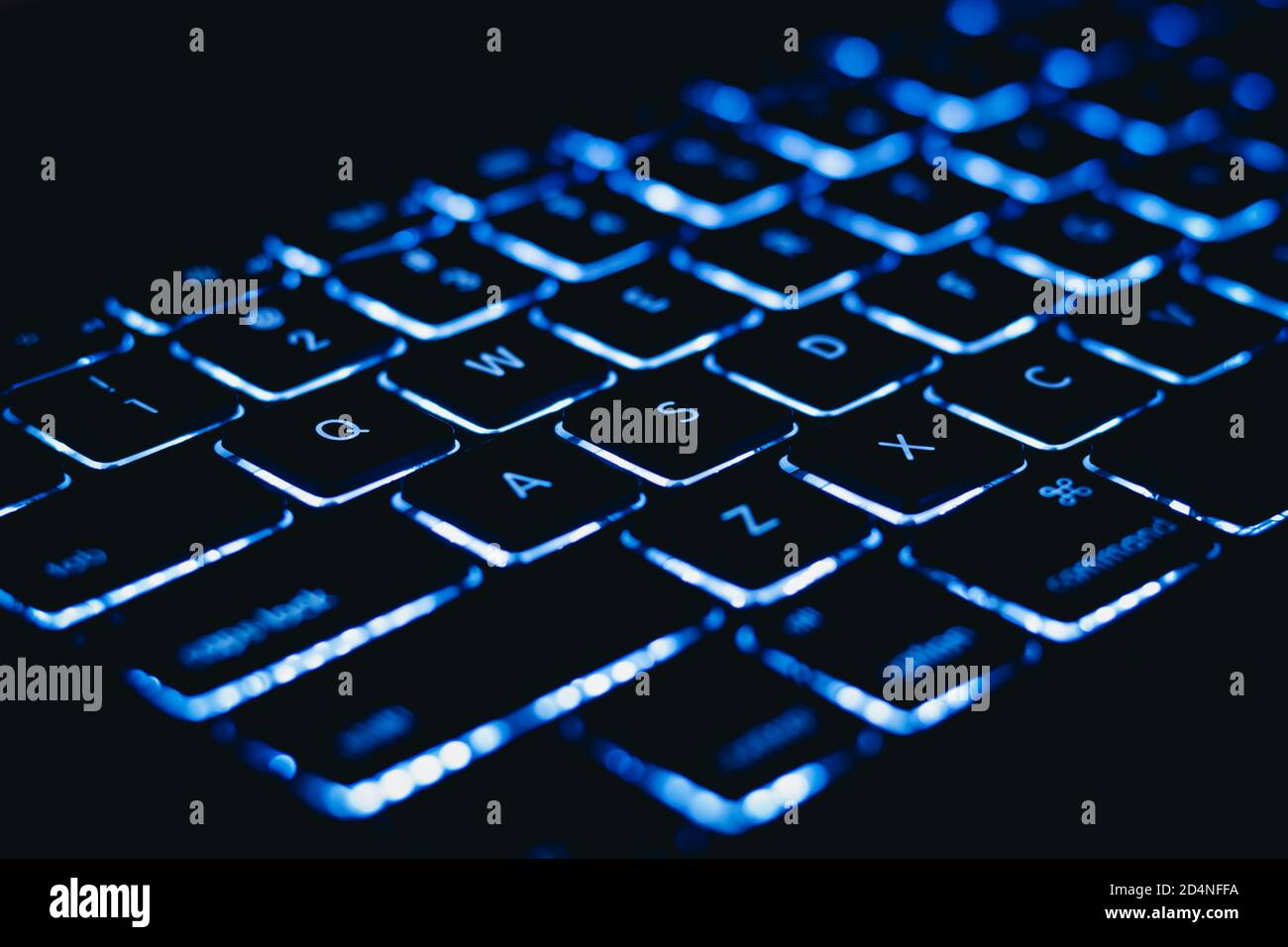 laptop keyboard with backlight - macbook Stock Photo - Alamy