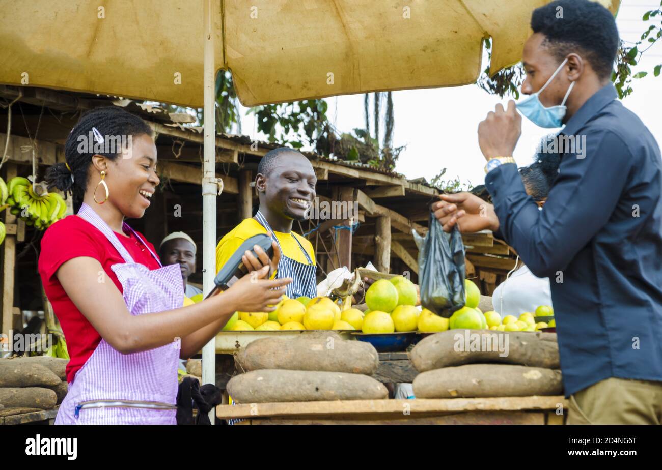 Two men transacting hi-res stock photography and images - Alamy