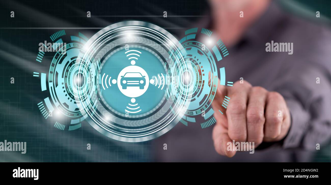 Man touching a smart car concept on a touch screen with his finger ...