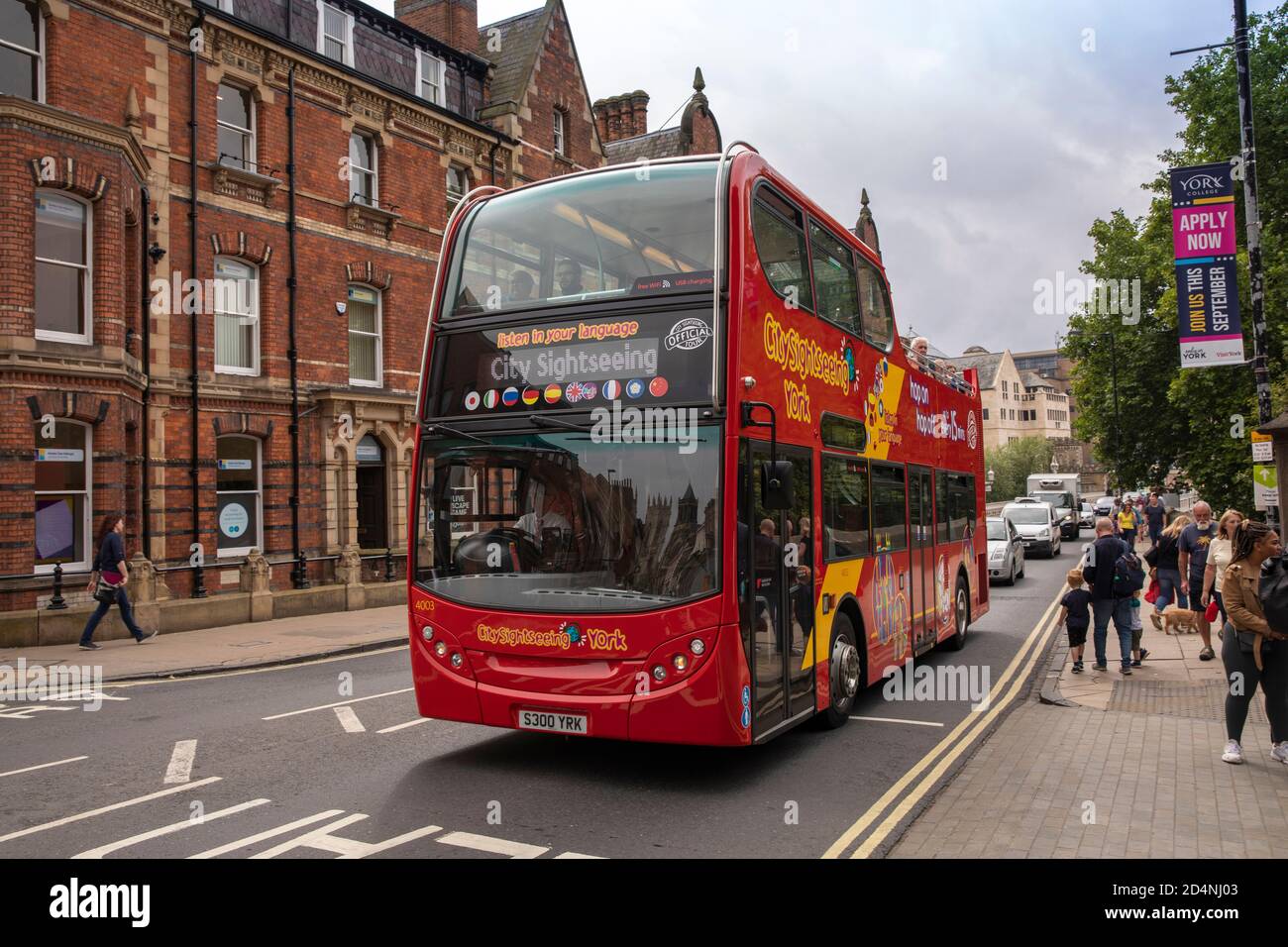 UK, England, Yorkshire, York, Museum Street, open topped red City ...