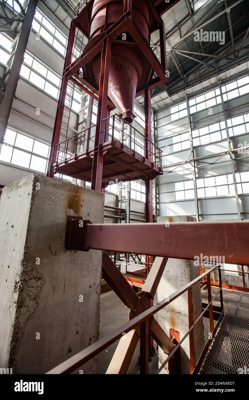 Glass factory. New industrial building construction. Assembling ...