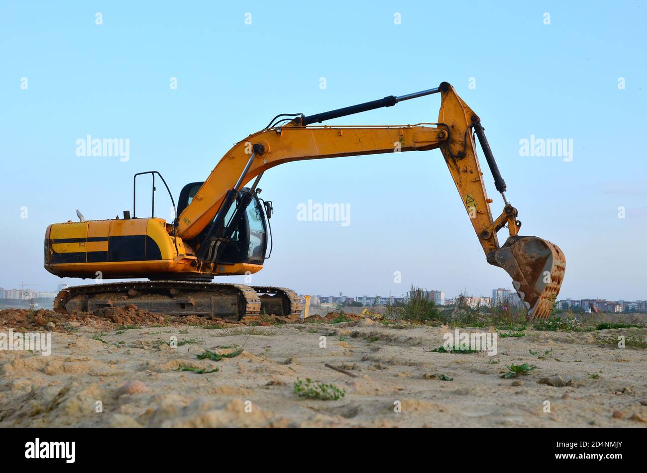 Hydraulic excavator installing pipeline hi-res stock photography and ...