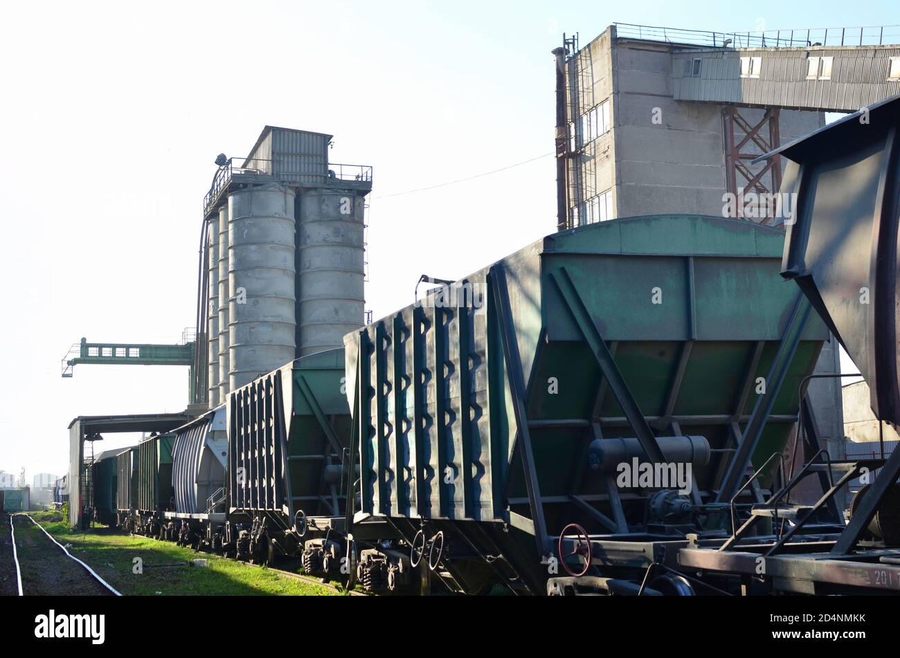 Railroad cars at cement manufacturing plant. Ready-mix and building ...
