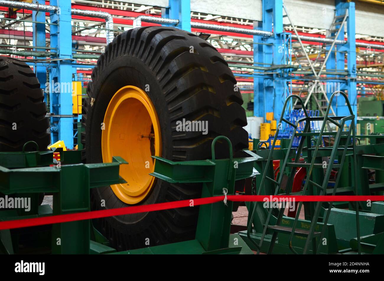 Warehouse with tires for mining trucks at an industrial plant for the ...