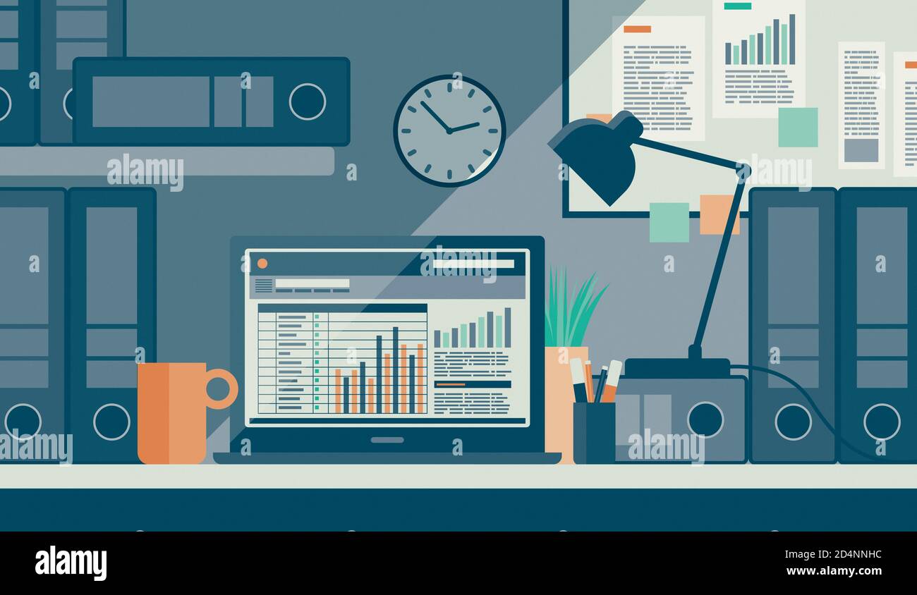 Desktop with laptop and financial charts, business management and ...