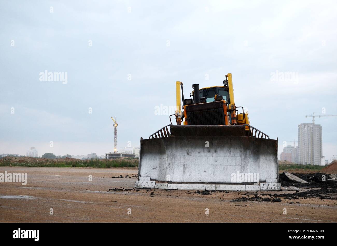 Track-type bulldozer during of large construction jobs at building site ...