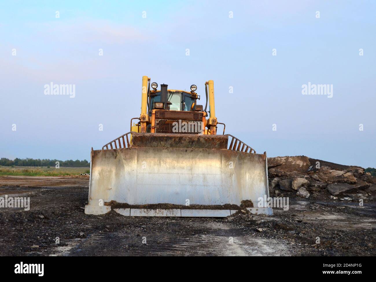 Dozer with bucket for pool excavation and utility trenching. Bulldozer ...