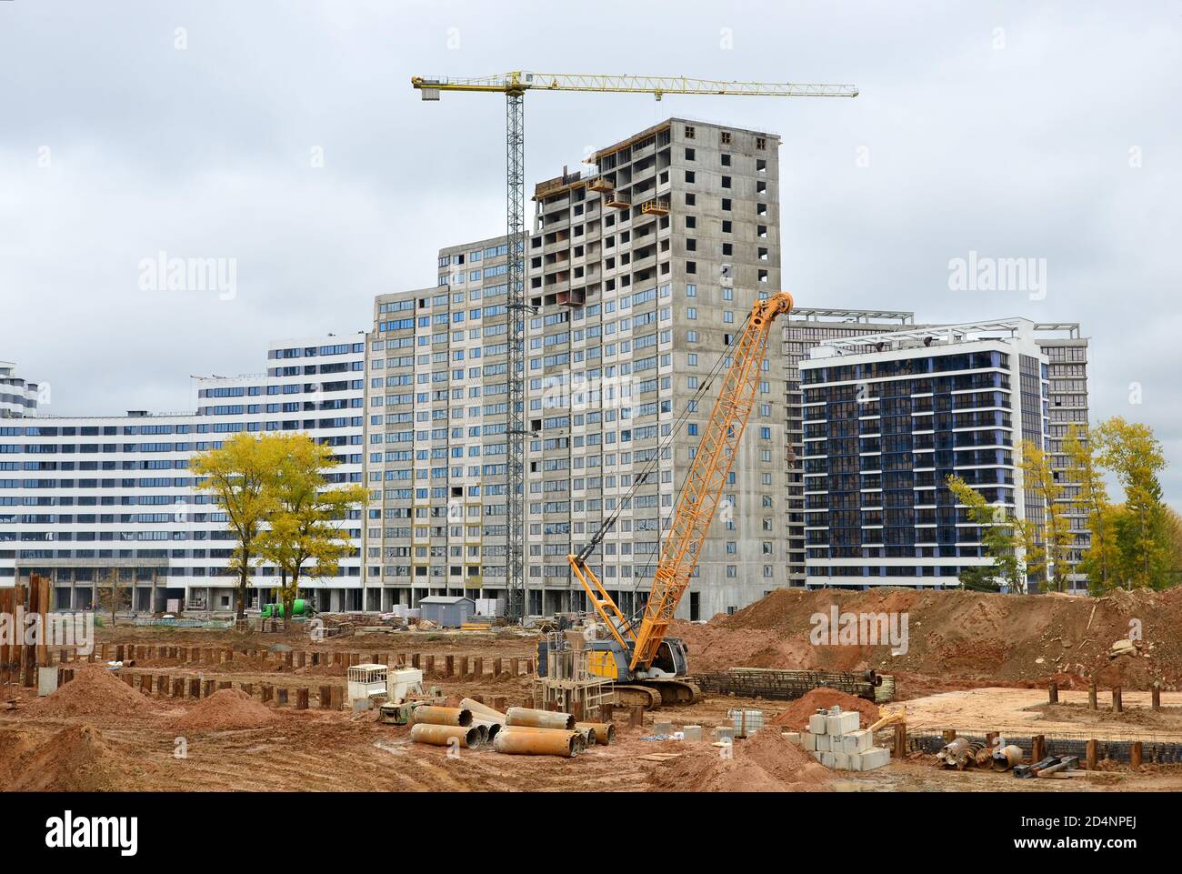 Crawler crane at the construction site. Digging a pit for the building ...