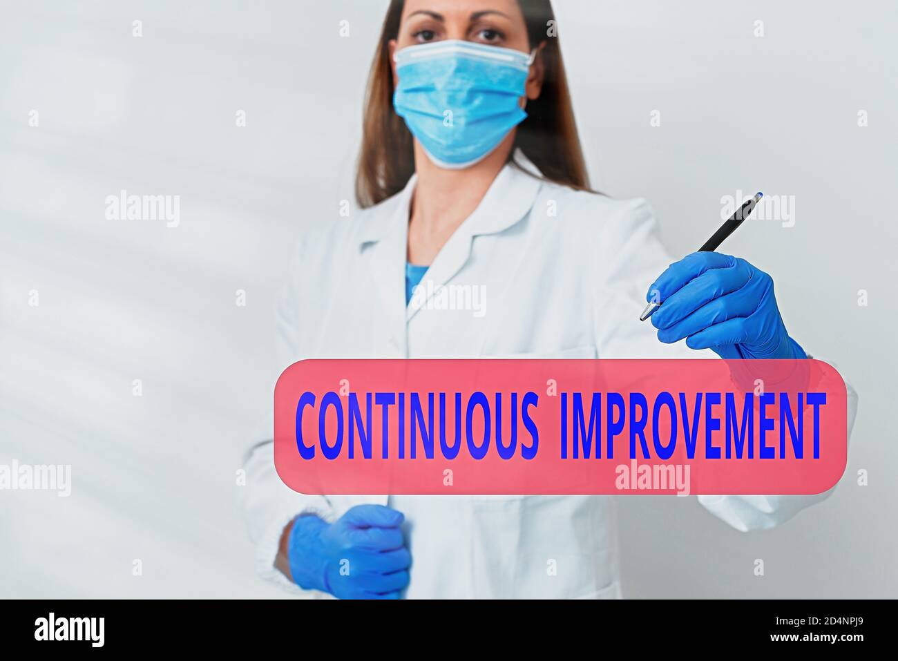 Writing note showing Continuous Improvement. Business concept for ...