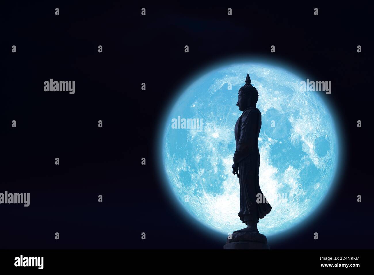 Sunday Buddha and full blue moon on night sky in the Asanha bucha day ...