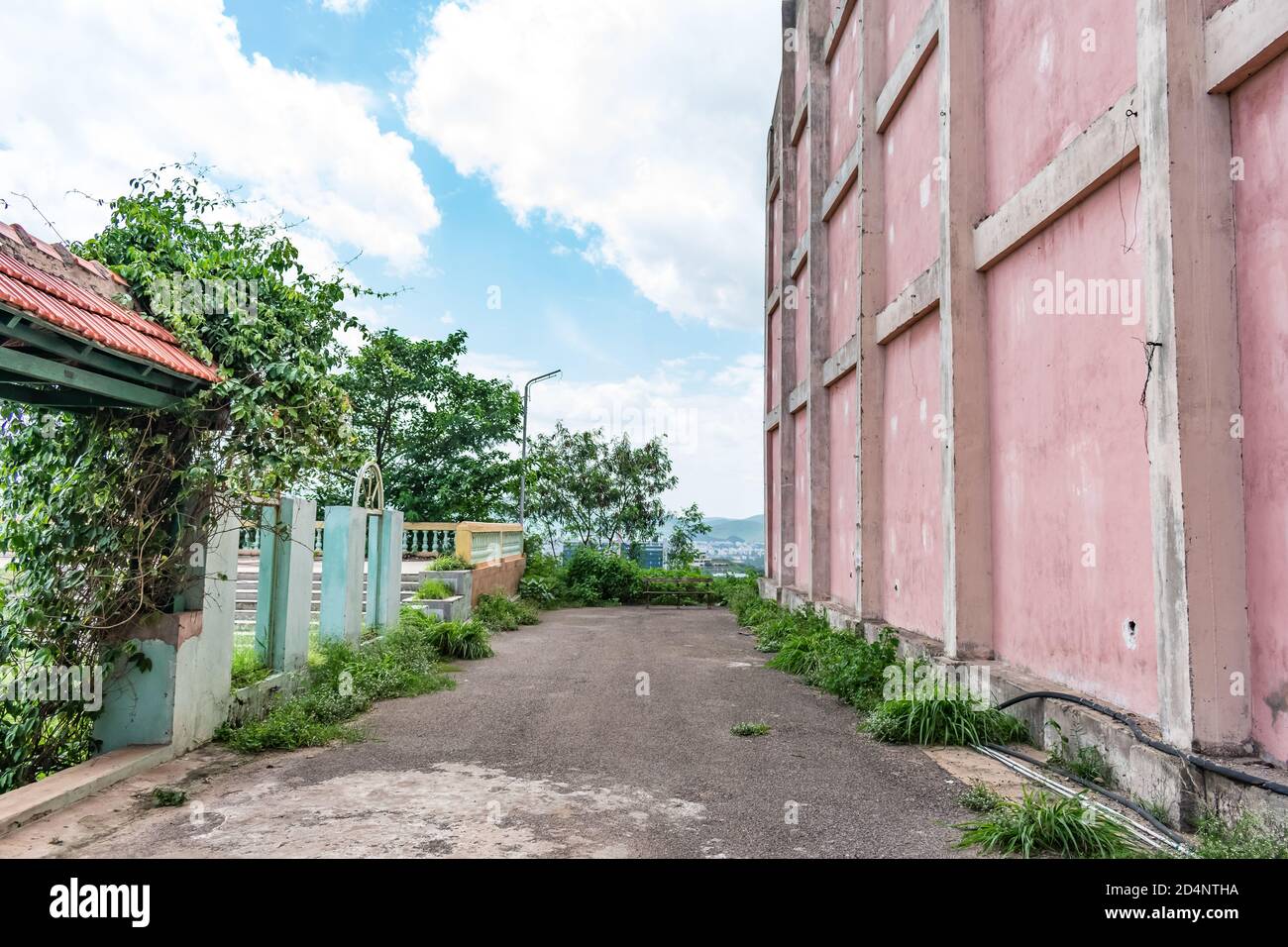Road crossing in between two building of a colony at Indian society ...