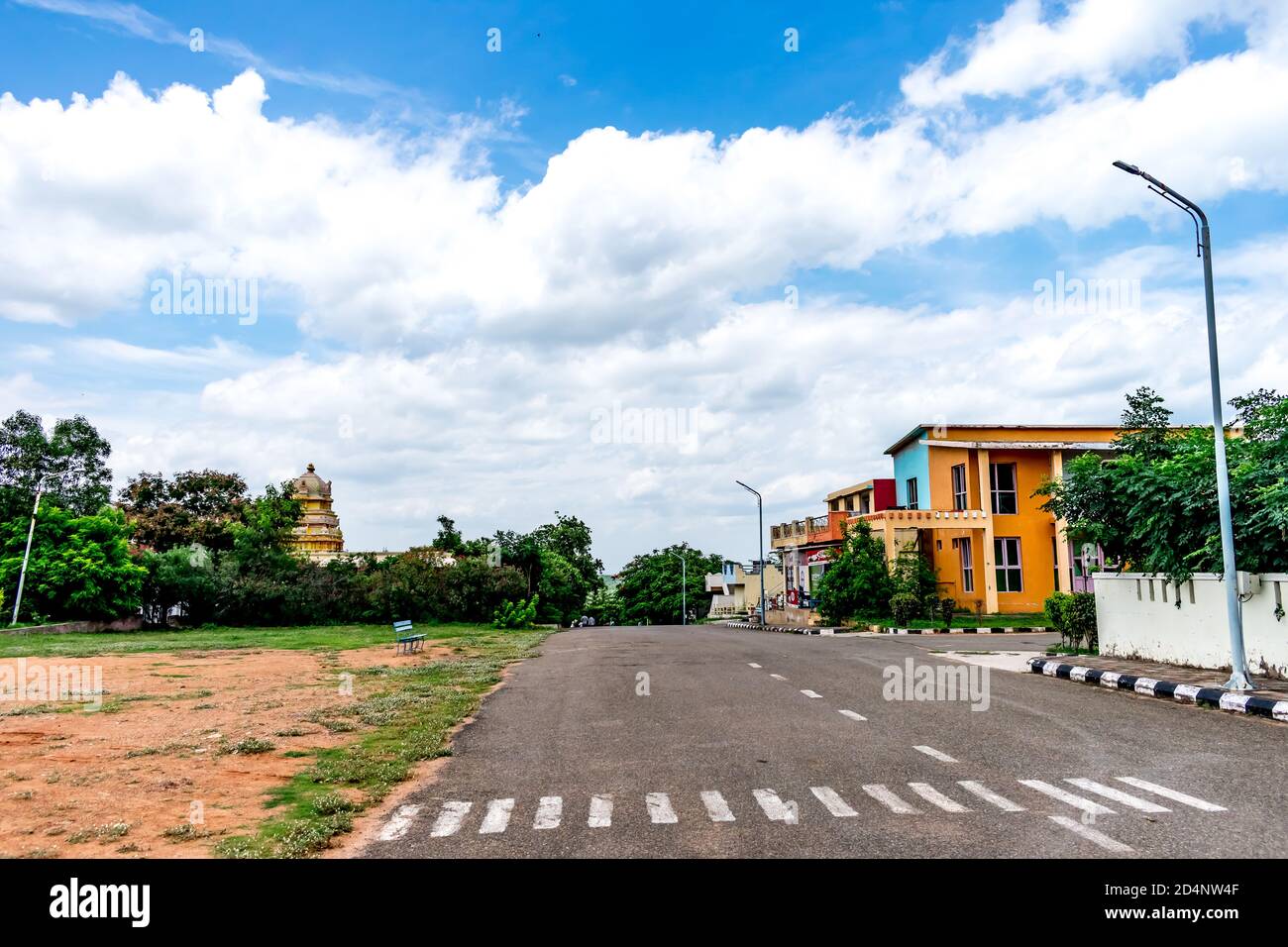 Road crossing in between two building of a colony at Indian society ...