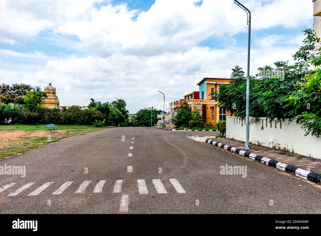 Road crossing in between two building of a colony at Indian society ...