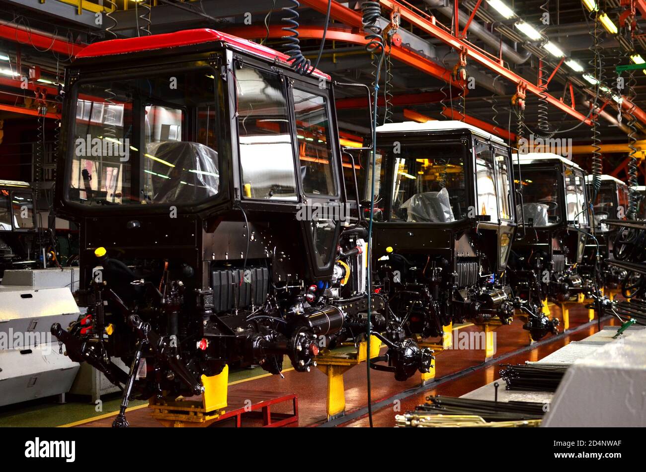 Tractor Manufacture works. Assembly line inside the agricultural ...