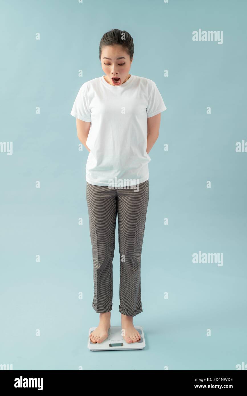 woman very worried with her weight Stock Photo - Alamy