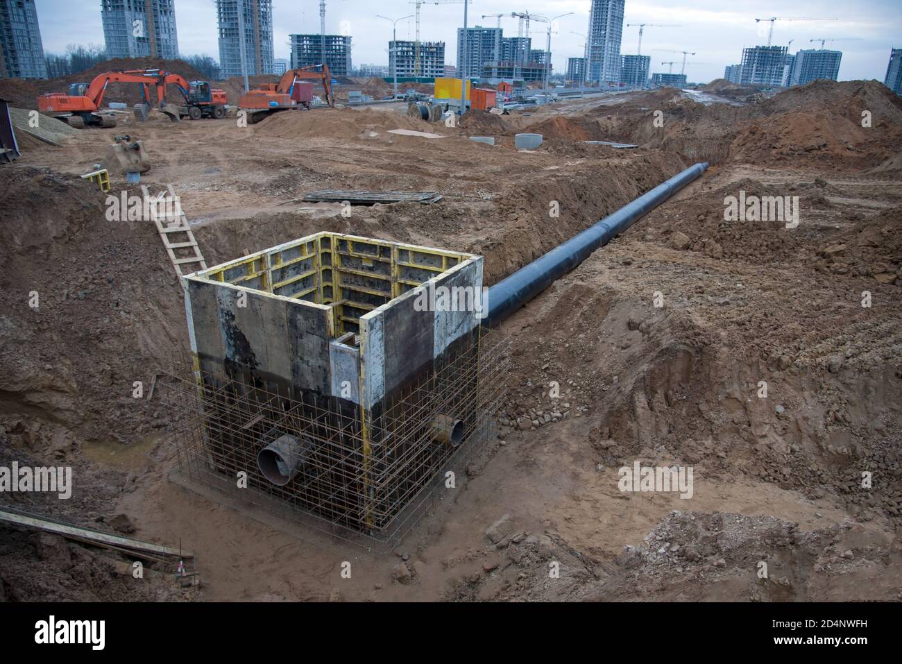 Connecting a trench drain to a concrete manhole structure at ...